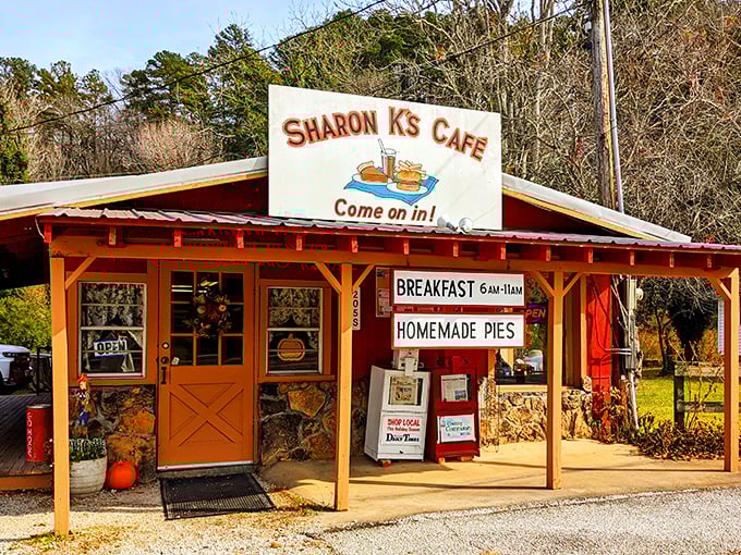 Welcome to pie paradise! Sharon K's Cafe beckons with its charming red exterior and promises of homemade delights. It's like a warm hug for your taste buds.
