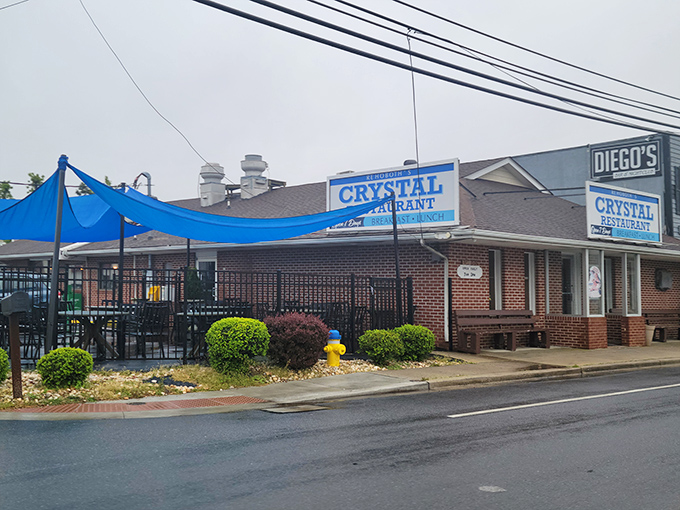 A beacon of breakfast bliss! The Crystal Restaurant's unassuming exterior hides a world of culinary delights, proving that sometimes the best gems come in brick packages.