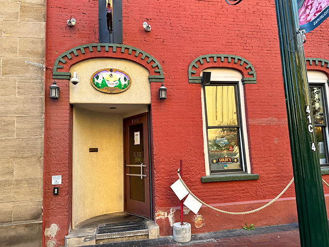 A red-brick beacon of breakfast bliss! Goldy's charming exterior promises morning magic within its cozy confines.