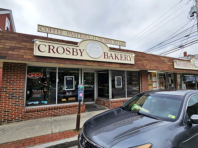 Welcome to carb heaven! Crosby Bakery's charming exterior promises a world of delectable treats waiting just beyond those brick walls.