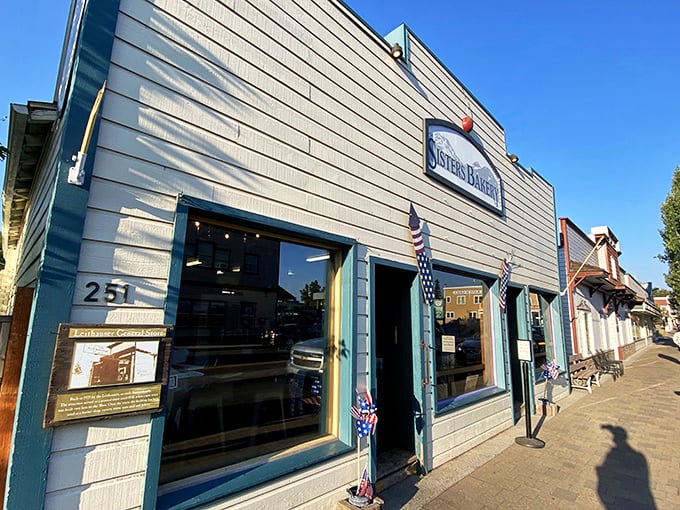 Welcome to carb heaven! Sisters Bakery's charming exterior is like a siren call to pastry lovers, complete with patriotic flair.