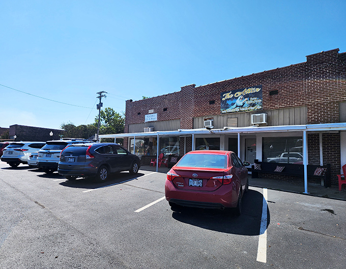 The unassuming brick fa&ccedil;ade of Charlotte's Eats & Sweets stands like a culinary lighthouse in tiny Keo, beckoning hungry travelers with promises of homemade delights inside.