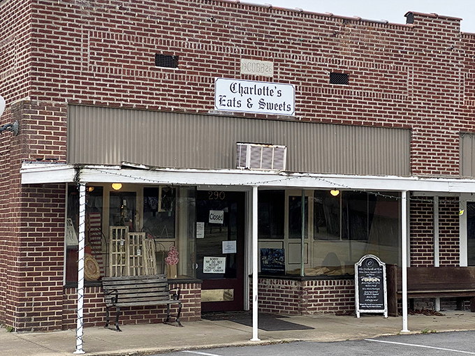 The unassuming brick fa&ccedil;ade of Charlotte's Eats & Sweets stands like a culinary lighthouse in tiny Keo, beckoning hungry travelers with promises of homemade delights inside.