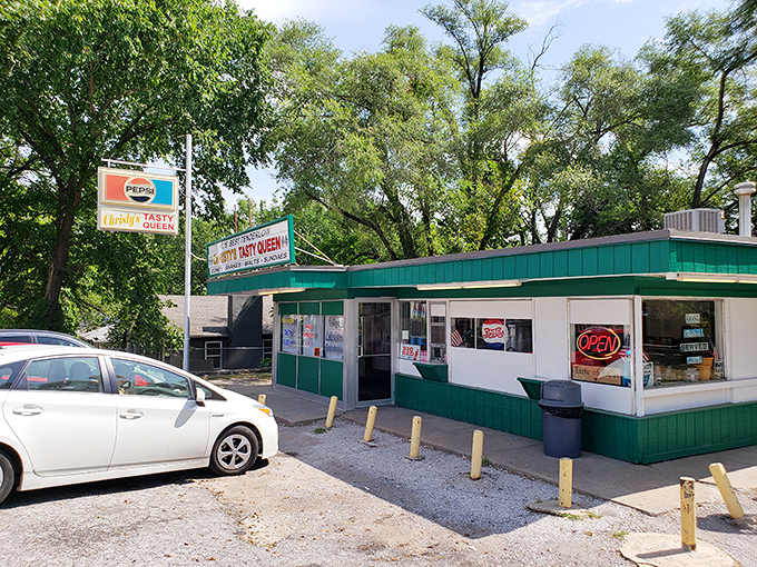 The teal-green time capsule with its vintage Pepsi sign promises what every great food pilgrimage needs: zero pretension and maximum flavor.