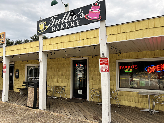 Welcome to carb heaven! Tullio's sunny exterior beckons like a siren song, promising delectable treats and coastal charm just steps from the beach.