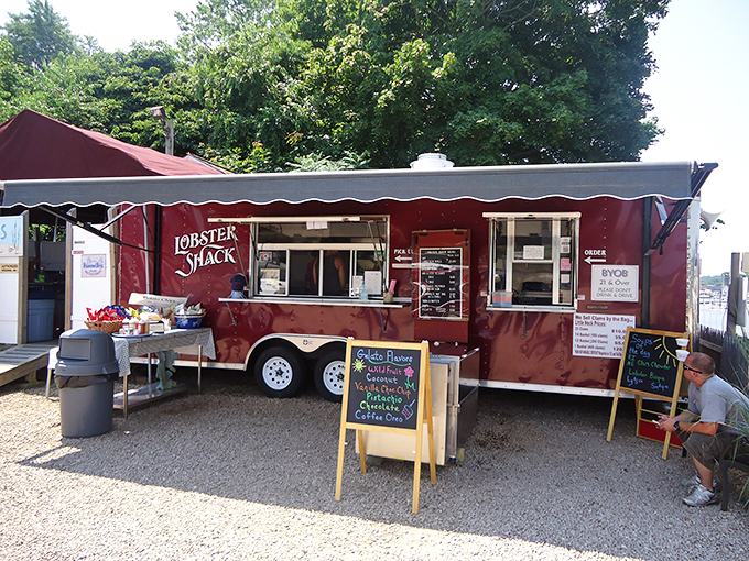Welcome to lobster paradise! This charming red-roofed haven is where seafood dreams come true, complete with a view that'll make your taste buds dance.