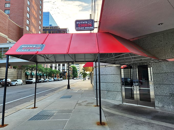 Welcome to flavor town! Ruth's Chris Steak House's iconic red awning beckons you into a world where steak dreams come true.