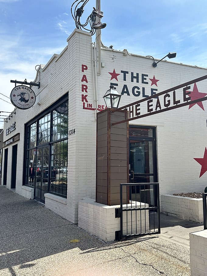The bold eagle mural watches over this Louisville gem like a patriotic street art guardian announcing "deliciousness lives here."