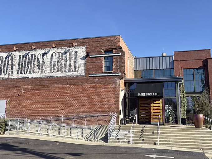 Step into a time machine with a side of Southern charm! The Iron Horse Grill's exterior blends historic brick with modern flair, promising a feast for all senses.