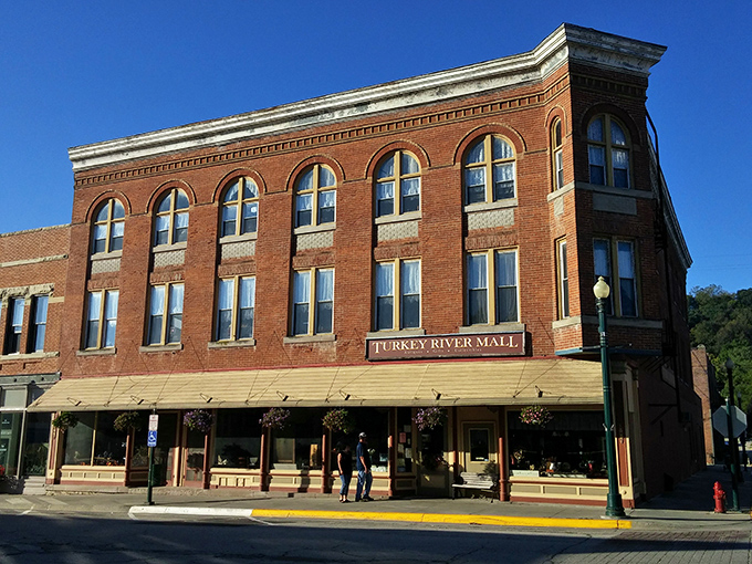 Step into a time machine disguised as a storefront! The Turkey River Mall's charming exterior promises a journey through decades of treasures.
