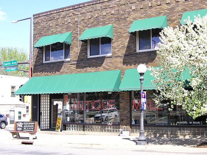 Step right up to the time machine! This brick-and-mortar portal to the past, with its inviting green awnings, promises a treasure trove of memories inside.