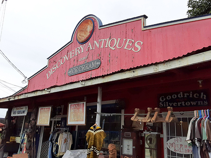 Welcome to the Technicolor dreamcoat of antique stores! This vibrant red barn isn't just eye-catching; it's a siren call to treasure hunters and ice cream lovers alike.