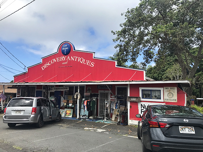 Welcome to the Technicolor dreamcoat of antique stores! This vibrant red barn isn't just eye-catching; it's a siren call to treasure hunters and ice cream lovers alike.