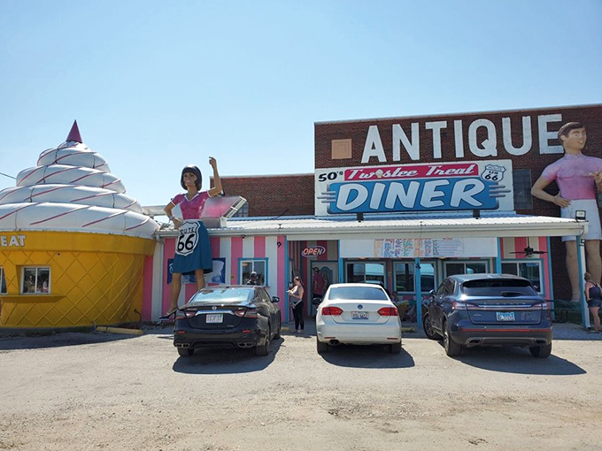 Welcome to Jurassic Park meets Barbie's Dream House! The Pink Elephant Antique Mall's exterior is a whimsical wonderland that'll make you do a double-take.