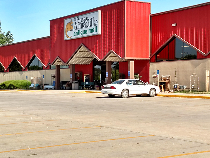 Welcome to the Brass Armadillo, where time travel is just a step through these red doors! This antique mall is like a giant, friendly barn filled with treasures.