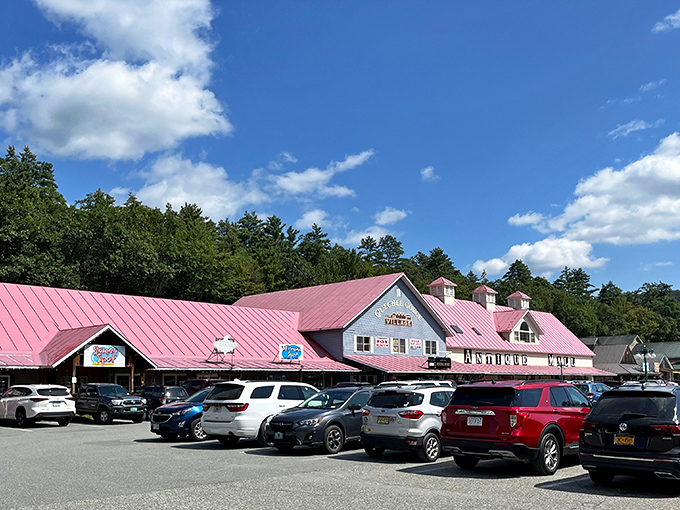 The iconic exterior of Vermont Antique Mall stands like a beacon of nostalgia against the Green Mountain backdrop, welcoming treasure hunters from near and far.