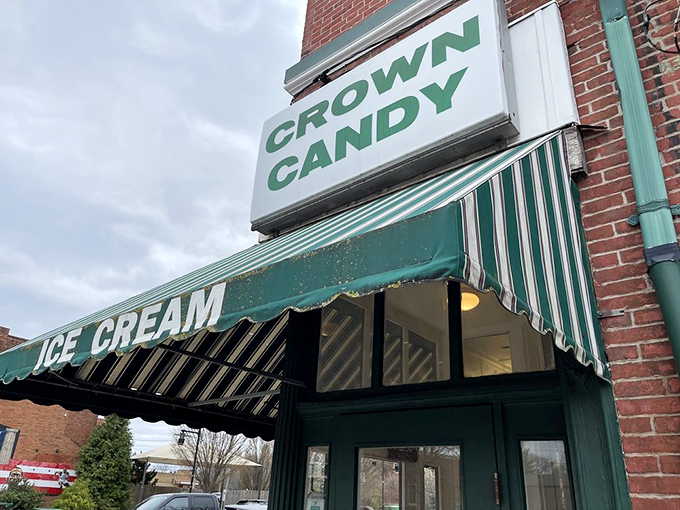 Step back in time! Crown Candy Kitchen's iconic green awning beckons like a beacon of sweetness, promising a sugary journey through St. Louis history.