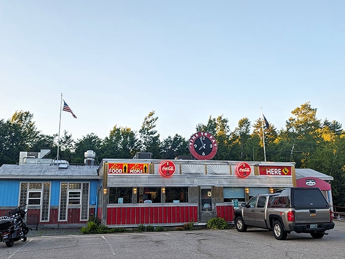 Step back in time! This retro diner's exterior is like a beacon calling all hungry time-travelers. Red, white, and chrome &ndash; the holy trinity of diner design.