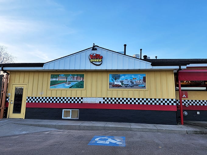 Step back in time! B'Ville Diner's sunny yellow exterior promises a nostalgic journey that'll make you want to dust off your poodle skirt.
