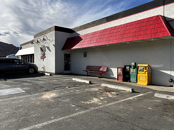 Welcome to the Moab Diner, where the 1950s never left and your diet goes on vacation. This retro gem stands proudly against the Utah sky, promising comfort food and a side of nostalgia.