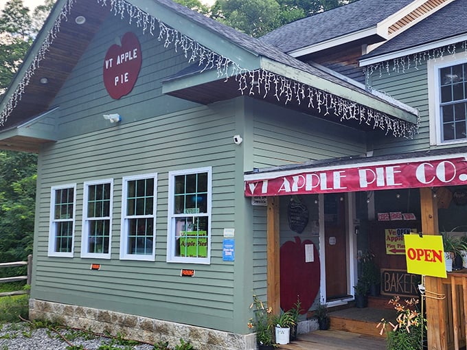 Welcome to pie paradise! This charming green cottage with twinkling lights is like a beacon for dessert lovers. It's the Emerald City for those following the yellow brick road to pastry perfection.