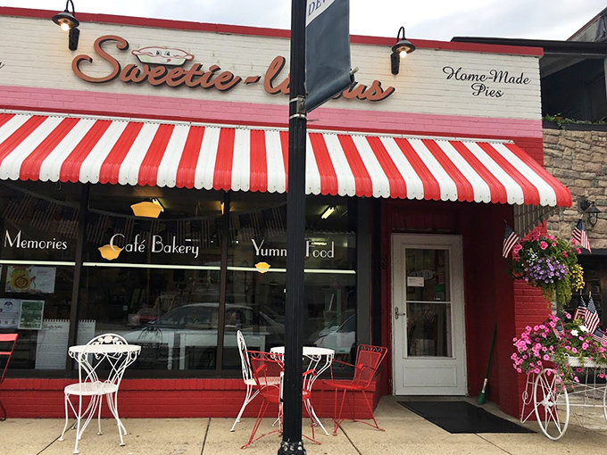 Step right up to pie paradise! Sweetie-licious beckons with its cherry-red exterior and classic striped awning, promising a slice of Americana and sugar-coated bliss.