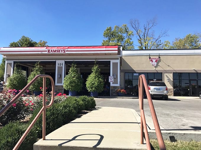 Welcome to flavor town! Ramsey's Diner beckons with its cheery red trim and promise of "Corn Daze" &ndash; a feast for both the eyes and the stomach.