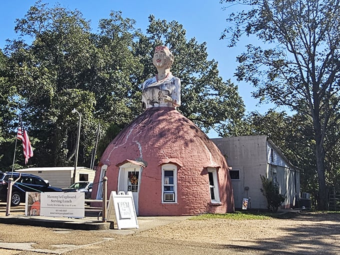A pink skirt that could house a giant? Nope, just Mammy's Cupboard, where Southern charm meets architectural whimsy on Highway 61.