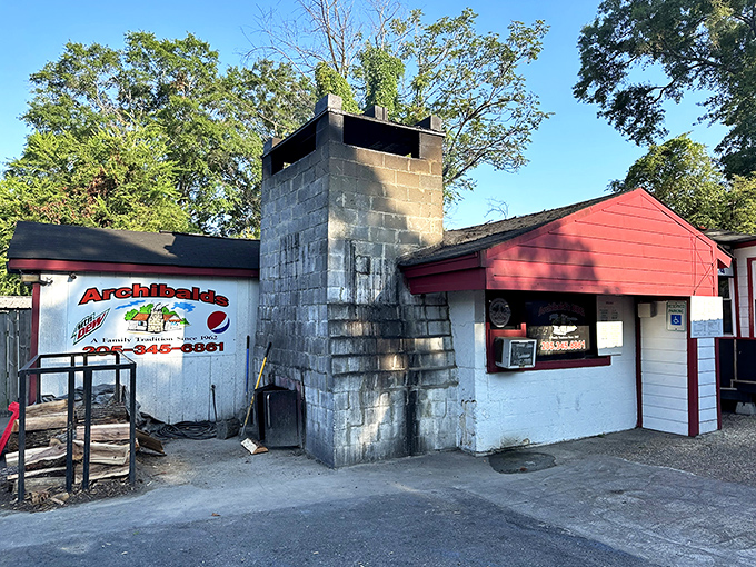 A barbecue beacon in brick and mortar! This unassuming red shack houses smoky treasures that'll make your taste buds dance with joy.