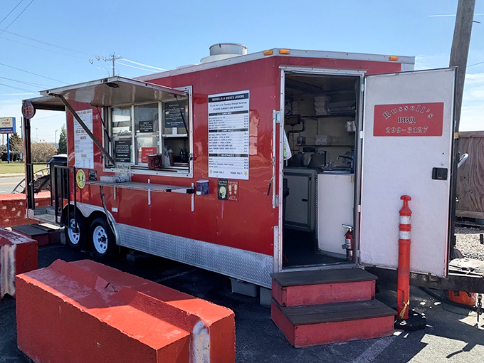 A fiery red beacon of barbecue bliss! Russell's food truck stands ready to satisfy your smoky cravings, with a menu that'll make your taste buds do a happy dance.
