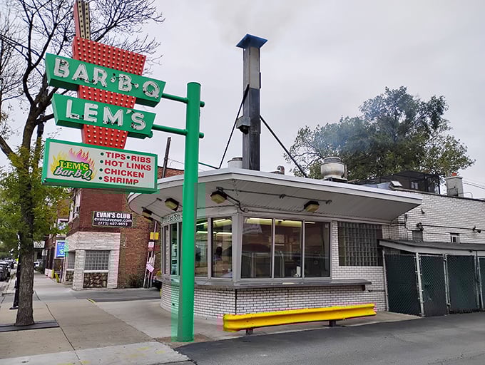 Welcome to barbecue nirvana! Lem's iconic green sign beckons like a smoky siren, promising ribs that'll make you forget your own name.