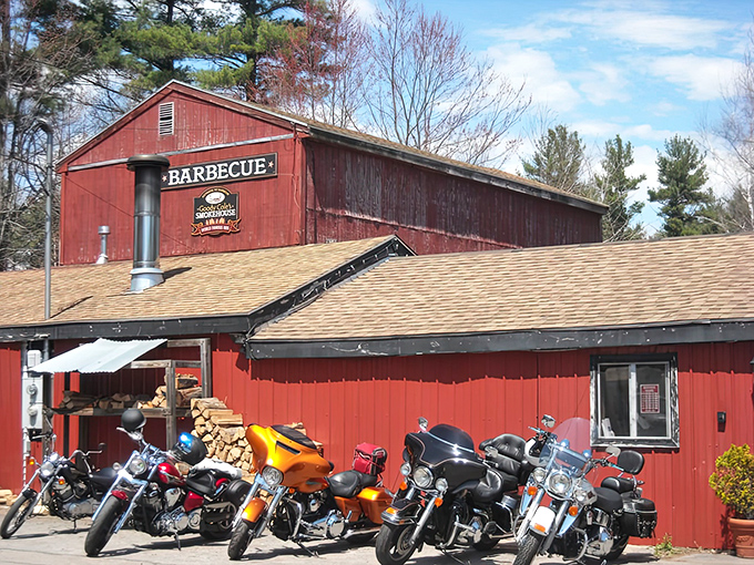 A red barn that promises barbecue bliss? It's like finding a meaty oasis in the New Hampshire wilderness!