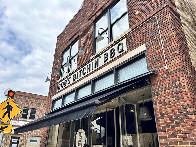 Brick and mortar never looked so delicious! Bob's Bitchin' BBQ beckons with its bold signage, promising a smoky adventure for your taste buds.