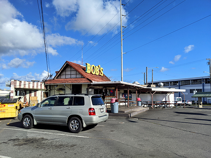 Welcome to Bob's, where the yellow sign shines brighter than a Hawaiian sunset. This no-frills spot is where barbecue dreams come true.