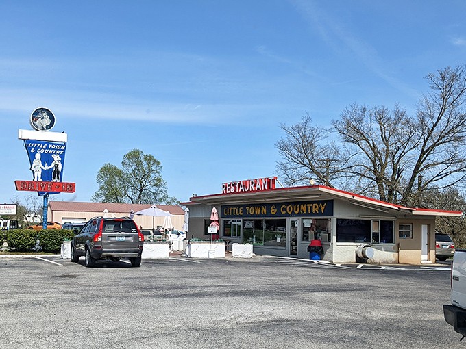 The classic roadside silhouette of Little Town & Country Restaurant stands as a beacon of hope for hungry travelers and breakfast enthusiasts alike.