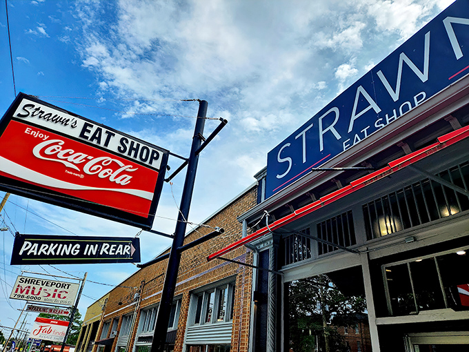 The iconic red awning of Strawn's beckons like a lighthouse for hungry souls. This unassuming brick storefront has been Shreveport's breakfast beacon since 1944.