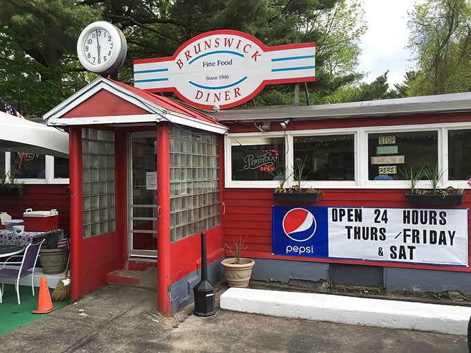 The fire-engine red exterior of Brunswick Diner stands like a beacon of breakfast hope, promising comfort food salvation to hungry travelers.