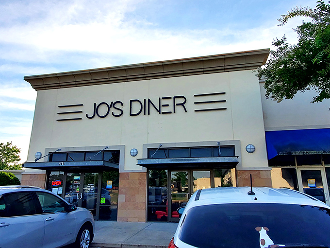The classic facade of Jo's Diner in Flowood welcomes hungry patrons with its clean lines and retro signage&mdash;a beacon of breakfast bliss in Mississippi.
