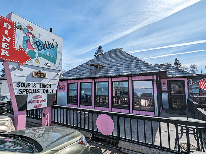 Step back in time! Betty's Diner's retro exterior, complete with a sassy cartoon waitress, promises a trip down memory lane and some seriously good eats.