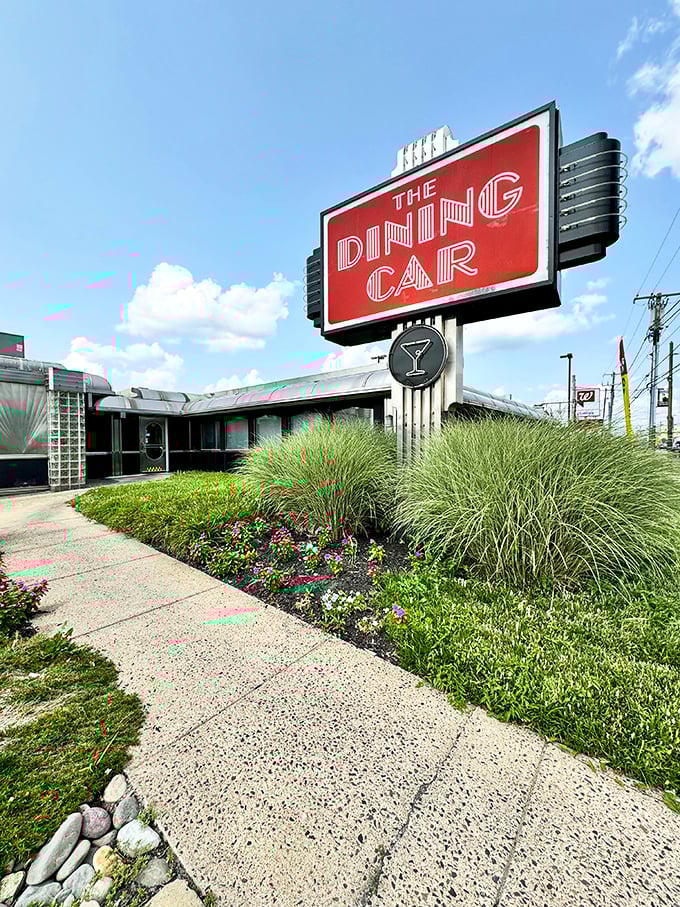 The gleaming Art Deco exterior of The Dining Car stands as a shining beacon of classic Americana, promising comfort food and nostalgia in equal measure.