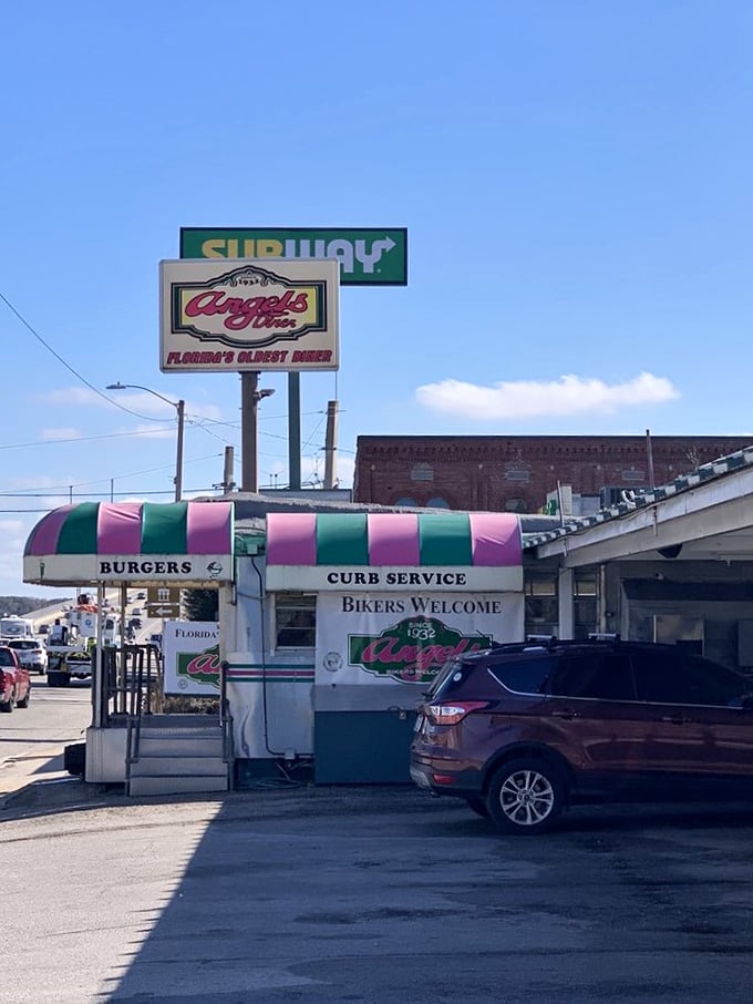 Step into a time machine disguised as a diner! Angel's Dining Car's exterior is a retro rainbow of promise, beckoning burger lovers with its iconic striped awning.