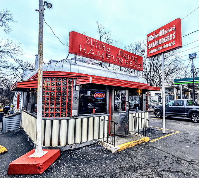 Neon dreams and burger schemes! White Manna's iconic sign beckons like a lighthouse for the hungry, guiding lost souls to slider salvation.