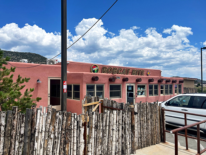 Pink adobe charm meets burger paradise! This unassuming exterior hides a world of flavor waiting to be discovered.