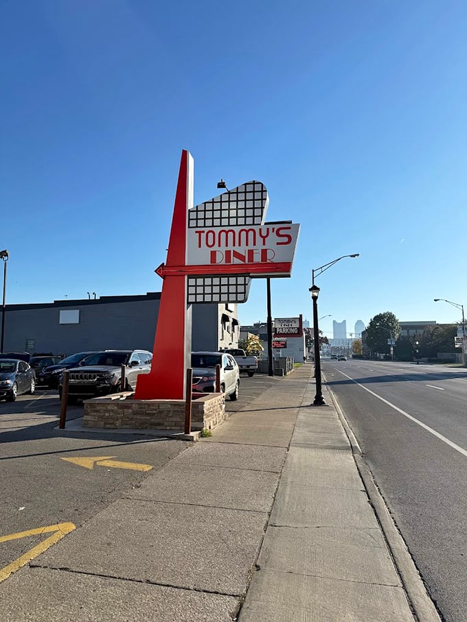 Welcome to burger paradise! Tommy's Diner's retro sign is like a beacon of hope for hungry souls in Columbus.