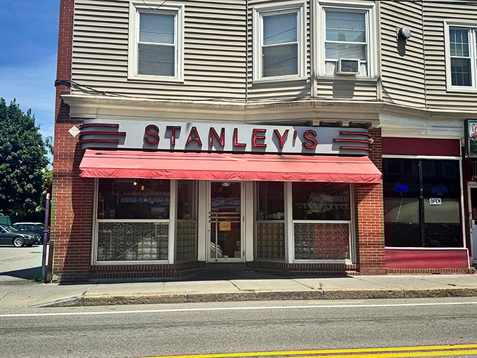 Step back in time! Stanley's iconic red awning and retro signage beckon you to a burger paradise that's been flipping patties since 1932.