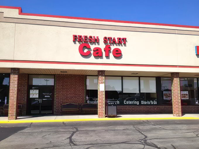 A beacon of breakfast bliss! Fresh Start Cafe's bold red sign promises a morning adventure that'll make you forget hitting the snooze button was ever an option.