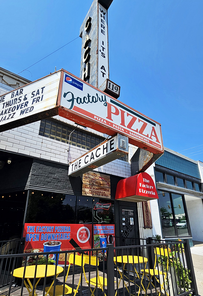 Welcome to pizza paradise! The Factory Pizzeria's vintage sign promises a slice of history with every bite.