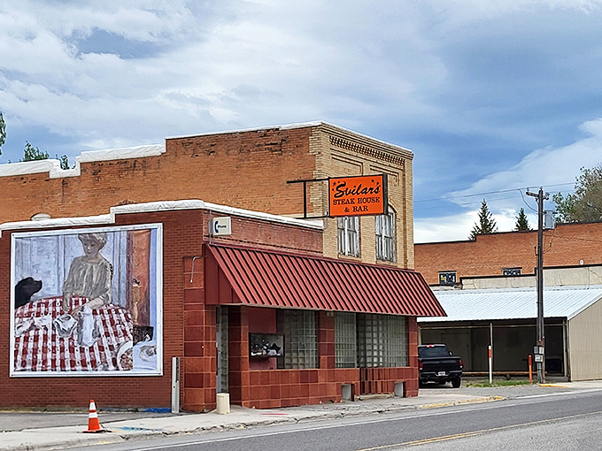 A red-brick beacon of culinary delight! Svilar's Steak House & Bar stands proud, its sign is a siren call to hungry travelers and locals alike.