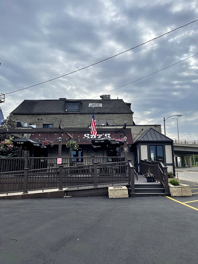 The unassuming stone fortress of flavor stands proudly on State Street, its patio beckoning with colorful hanging baskets&mdash;Milwaukee's worst-kept culinary secret.