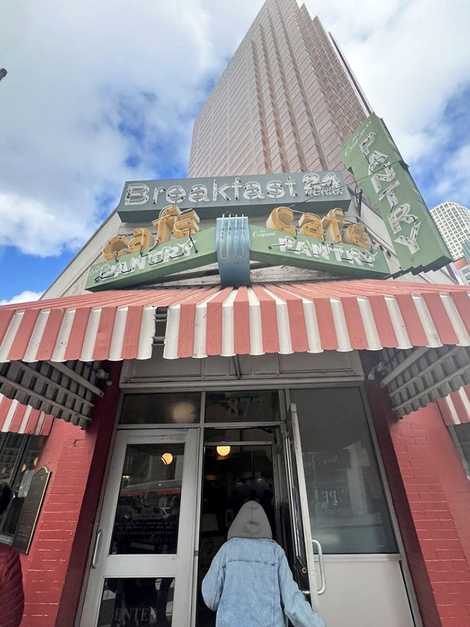 The iconic red and white exterior stands like a time capsule amid downtown LA's skyscrapers&mdash;a defiant reminder that some traditions are worth preserving.